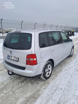 Grey Volkswagen Touran 2006 in Klaipeda, with an engine capacity of 2.00 L and mileage of 325 thousand km for 1750 €, photo 7 on AUTOMOTO.COM.LV