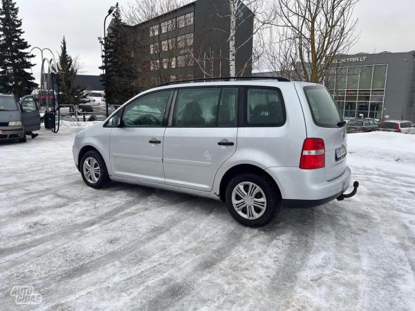 Grey Volkswagen Touran 2006 in Kaunas, with an engine capacity of 2.00 L and mileage of 12 thousand km for 1550 €, photo 1 on AUTOMOTO.COM.LV
