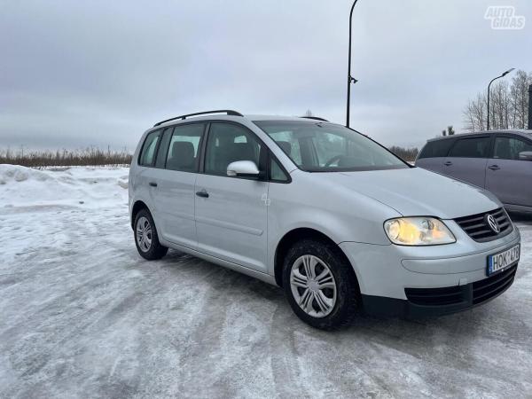 Grey Volkswagen Touran 2006 in Kaunas, with an engine capacity of 2.00 L and mileage of 12 thousand km for 1550 €, photo 6 on AUTOMOTO.COM.LV