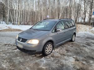 Pelēks Volkswagen Touran 2006 Viļņa, ar dzinēja tilpumu 1.90 L un nobraukumu 360 tūkst. km par 1450 €, foto  vietnē AUTOMOTO.COM.LV