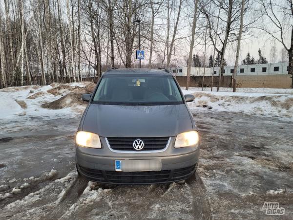 Pelēks Volkswagen Touran 2006 Viļņa, ar dzinēja tilpumu 1.90 L un nobraukumu 360 tūkst. km par 1450 €, foto 2 vietnē AUTOMOTO.COM.LV