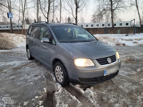Pelēks Volkswagen Touran 2006 Viļņa, ar dzinēja tilpumu 1.90 L un nobraukumu 360 tūkst. km par 1450 €, foto 3 vietnē AUTOMOTO.COM.LV