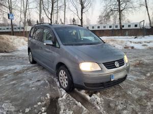 Pelēks Volkswagen Touran 2006 Viļņa, ar dzinēja tilpumu 1.90 L un nobraukumu 360 tūkst. km par 1450 €, foto 3 vietnē AUTOMOTO.COM.LV