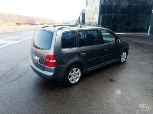 Grey Volkswagen Touran 2006 in Kaunas, with an engine capacity of 1.90 L and mileage of 337 thousand km for 1550 €, photo 2 on AUTOMOTO.COM.LV