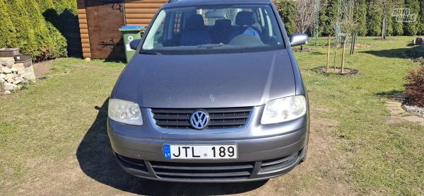 Pelēks Volkswagen Touran 2006 Kėdainiai, ar dzinēja tilpumu 1.90 L un nobraukumu 280 tūkst. km par 2000 €, foto 1 vietnē AUTOMOTO.COM.LV