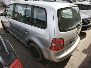 Grey Volkswagen Touran 2006 in Kaunas, with an engine capacity of 1.90 L and mileage of 275 thousand km for 480 €, photo 4 on AUTOMOTO.COM.LV