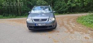 Grey Volkswagen Touran 2006 in Riga, with an engine capacity of 2.00 L and mileage of 218 thousand km for 2800 €, photo  on AUTOMOTO.COM.LV