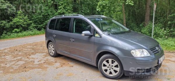 Grey Volkswagen Touran 2006 in Riga, with an engine capacity of 2.00 L and mileage of 218 thousand km for 2800 €, photo 2 on AUTOMOTO.COM.LV