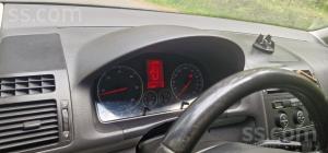 Grey Volkswagen Touran 2006 in Riga, with an engine capacity of 2.00 L and mileage of 218 thousand km for 2800 €, photo 9 on AUTOMOTO.COM.LV