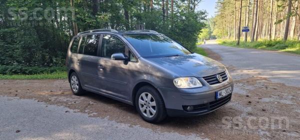 Grey Volkswagen Touran 2006 in Riga, with an engine capacity of 2.00 L and mileage of 218 thousand km for 2800 €, photo 2 on AUTOMOTO.COM.LV