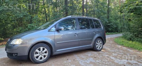 Grey Volkswagen Touran 2006 in Riga, with an engine capacity of 2.00 L and mileage of 218 thousand km for 2800 €, photo 6 on AUTOMOTO.COM.LV