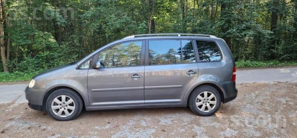 Grey Volkswagen Touran 2006 in Riga, with an engine capacity of 2.00 L and mileage of 218 thousand km for 2800 €, photo 7 on AUTOMOTO.COM.LV