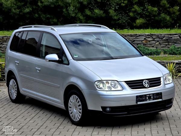 Grey Volkswagen Touran 2006 in Vilnius, with an engine capacity of 2.00 L and mileage of 289 thousand km for 2800 €, photo 1 on AUTOMOTO.COM.LV