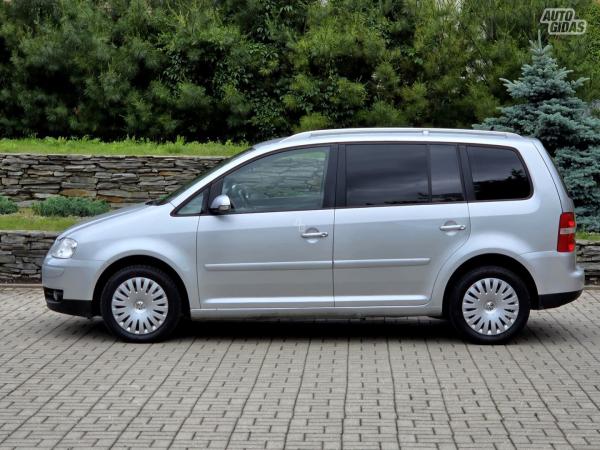 Grey Volkswagen Touran 2006 in Vilnius, with an engine capacity of 2.00 L and mileage of 289 thousand km for 2800 €, photo 5 on AUTOMOTO.COM.LV