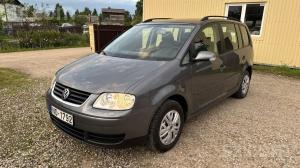 Pelēks Volkswagen Touran 2006 Rēzekne, ar dzinēja tilpumu 2.00 L un nobraukumu 316 tūkst. km par 2350 €, foto  vietnē AUTOMOTO.COM.LV