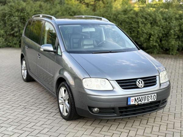 Pelēks Volkswagen Touran 2006 Viļņa, ar dzinēja tilpumu 2.00 L un nobraukumu 295 tūkst. km par 1700 €, foto 1 vietnē AUTOMOTO.COM.LV