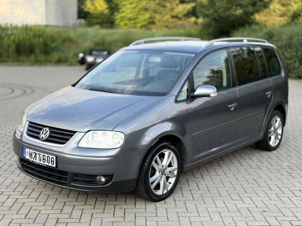 Pelēks Volkswagen Touran 2006 Viļņa, ar dzinēja tilpumu 2.00 L un nobraukumu 295 tūkst. km par 1700 €, foto 2 vietnē AUTOMOTO.COM.LV