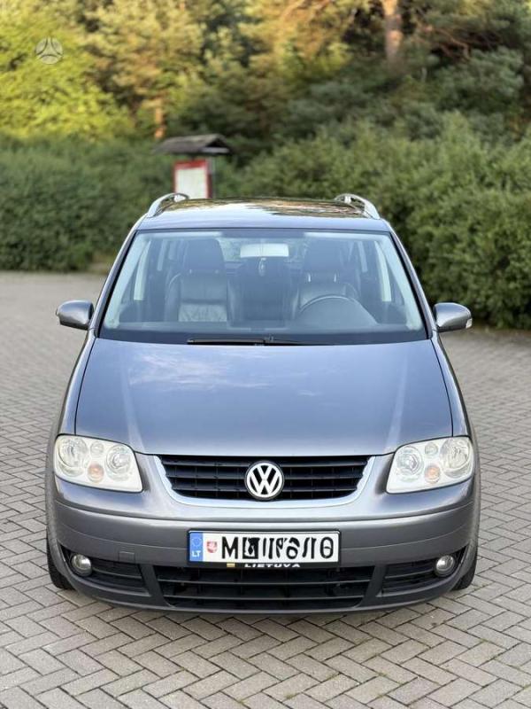 Grey Volkswagen Touran 2006 in Vilnius, with an engine capacity of 2.00 L and mileage of 295 thousand km for 1700 €, photo 3 on AUTOMOTO.COM.LV