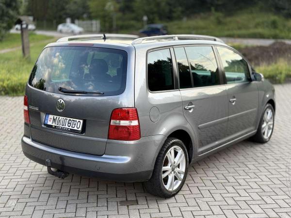 Grey Volkswagen Touran 2006 in Vilnius, with an engine capacity of 2.00 L and mileage of 295 thousand km for 1700 €, photo 4 on AUTOMOTO.COM.LV