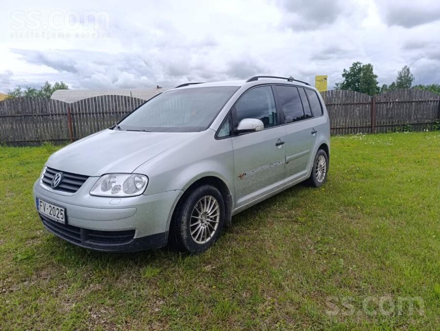 Pelēks Volkswagen Touran 2006 Aizkraukle, ar dzinēja tilpumu 1.90 L un nobraukumu 412 tūkst. km par 650 €, foto 1 vietnē AUTOMOTO.COM.LV