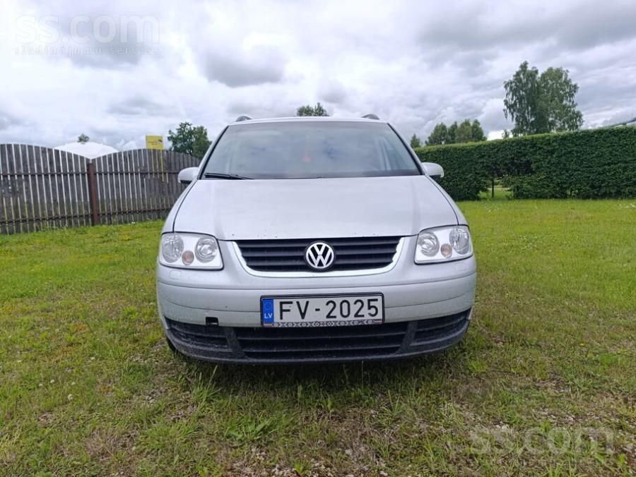 Pelēks Volkswagen Touran 2006 Aizkraukle, ar dzinēja tilpumu 1.90 L un nobraukumu 412 tūkst. km par 650 €, foto 4 vietnē AUTOMOTO.COM.LV