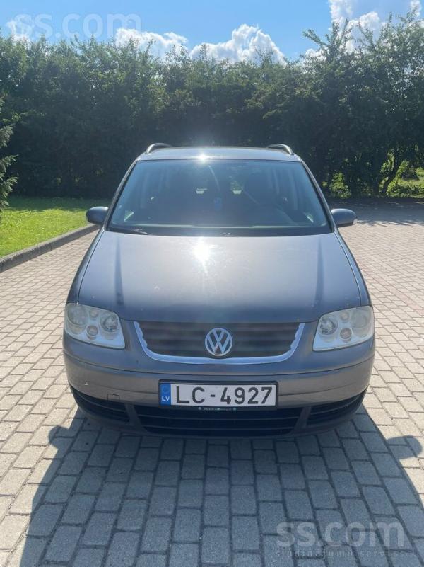 Grey Volkswagen Touran 2006 in Dobele, with an engine capacity of 1.90 L and mileage of 352 thousand km for 1500 €, photo 1 on AUTOMOTO.COM.LV