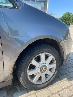 Pelēks Volkswagen Touran 2006 Dobele, ar dzinēja tilpumu 1.90 L un nobraukumu 352 tūkst. km par 1500 €, foto 4 vietnē AUTOMOTO.COM.LV