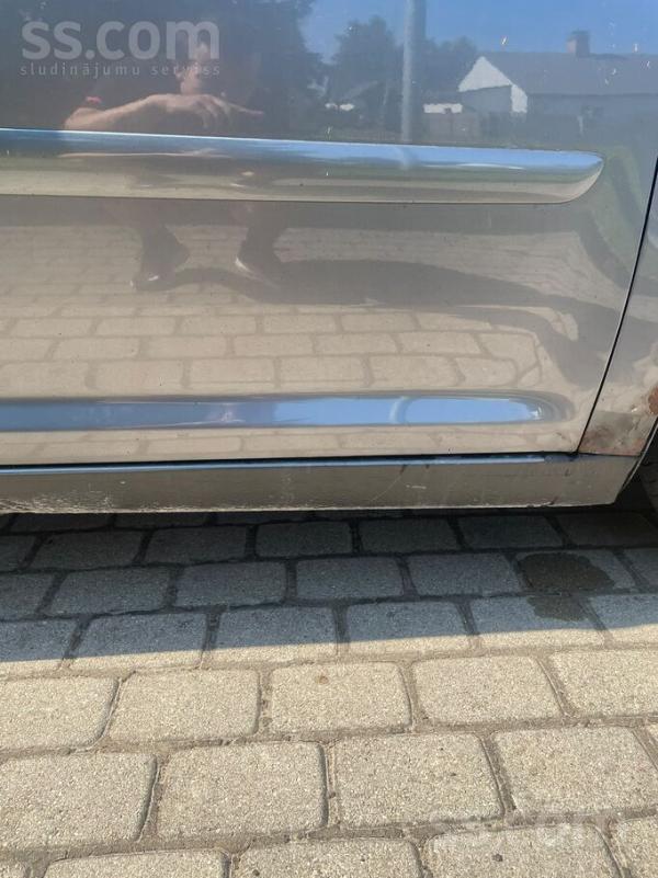 Grey Volkswagen Touran 2006 in Dobele, with an engine capacity of 1.90 L and mileage of 352 thousand km for 1500 €, photo 4 on AUTOMOTO.COM.LV