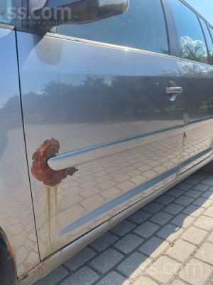 Pelēks Volkswagen Touran 2006 Dobele, ar dzinēja tilpumu 1.90 L un nobraukumu 352 tūkst. km par 1500 €, foto 11 vietnē AUTOMOTO.COM.LV