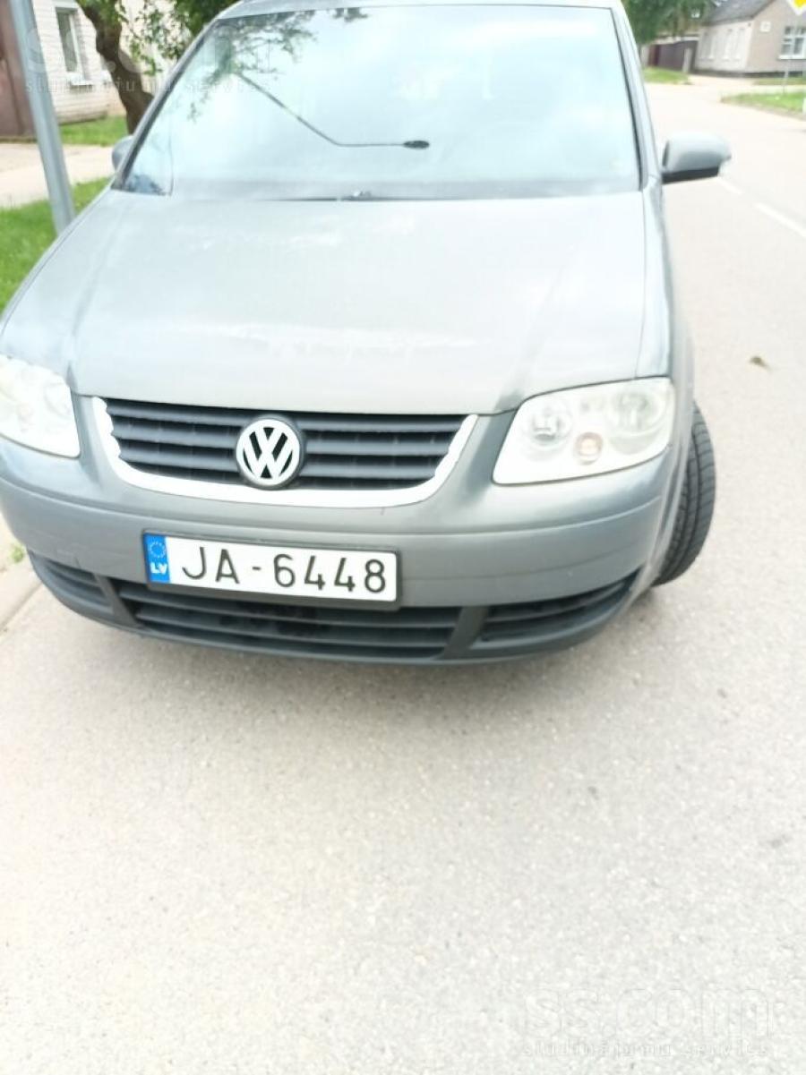 Pelēks Volkswagen Touran 2006 Daugavpils, ar dzinēja tilpumu 1.90 L un nobraukumu 205 tūkst. km par 1600 €, foto 10 vietnē AUTOMOTO.COM.LV