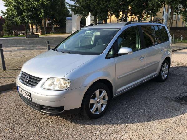 Grey Volkswagen Touran 2006 in Raseiniai, with an engine capacity of 1.97 L and mileage of 190 thousand km for 2650 €, photo 1 on AUTOMOTO.COM.LV