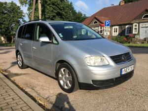 Grey Volkswagen Touran 2006 in Raseiniai, with an engine capacity of 1.97 L and mileage of 190 thousand km for 2650 €, photo 8 on AUTOMOTO.COM.LV