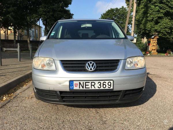 Grey Volkswagen Touran 2006 in Raseiniai, with an engine capacity of 1.97 L and mileage of 190 thousand km for 2650 €, photo 8 on AUTOMOTO.COM.LV