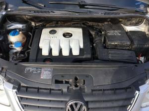 Grey Volkswagen Touran 2006 in Raseiniai, with an engine capacity of 1.97 L and mileage of 190 thousand km for 2650 €, photo 20 on AUTOMOTO.COM.LV