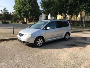 Grey Volkswagen Touran 2006 in Raseiniai, with an engine capacity of 1.97 L and mileage of 190 thousand km for 2650 €, photo 21 on AUTOMOTO.COM.LV