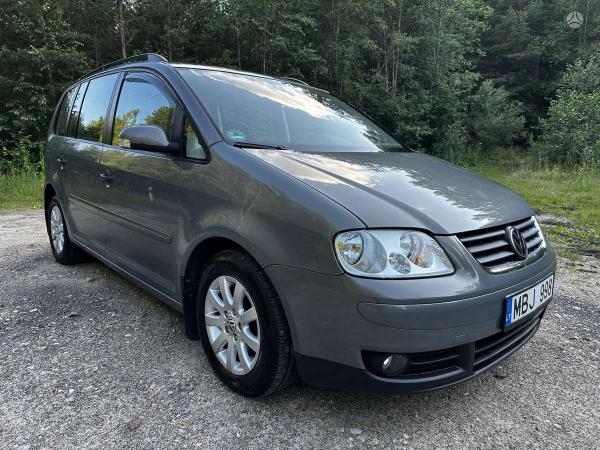 Grey Volkswagen Touran 2006 in Vilnius, with an engine capacity of 1.90 L and mileage of 370 thousand km for 1500 €, photo 1 on AUTOMOTO.COM.LV