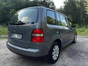 Grey Volkswagen Touran 2006 in Vilnius, with an engine capacity of 1.90 L and mileage of 370 thousand km for 1500 €, photo 4 on AUTOMOTO.COM.LV