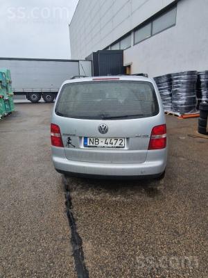 Grey Volkswagen Touran 2006 in Riga, with an engine capacity of 2.00 L and mileage of 266 thousand km for 2250 €, photo 3 on AUTOMOTO.COM.LV