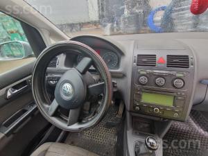 Grey Volkswagen Touran 2006 in Riga, with an engine capacity of 2.00 L and mileage of 266 thousand km for 2250 €, photo 6 on AUTOMOTO.COM.LV