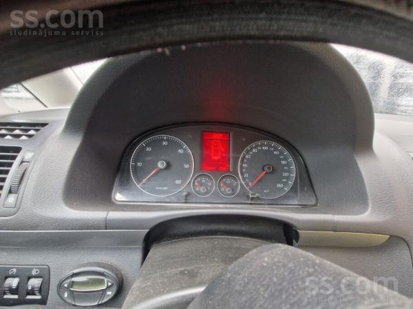 Grey Volkswagen Touran 2006 in Riga, with an engine capacity of 2.00 L and mileage of 266 thousand km for 2250 €, photo 6 on AUTOMOTO.COM.LV