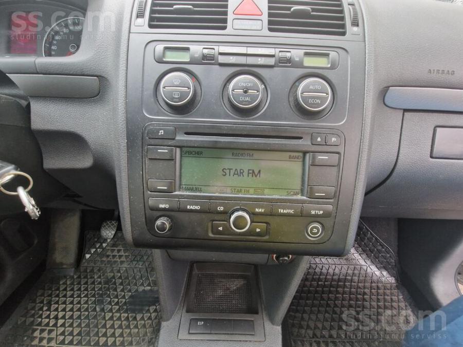 Grey Volkswagen Touran 2006 in Riga, with an engine capacity of 2.00 L and mileage of 266 thousand km for 2250 €, photo 8 on AUTOMOTO.COM.LV