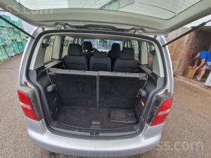 Grey Volkswagen Touran 2006 in Riga, with an engine capacity of 2.00 L and mileage of 266 thousand km for 2250 €, photo 11 on AUTOMOTO.COM.LV