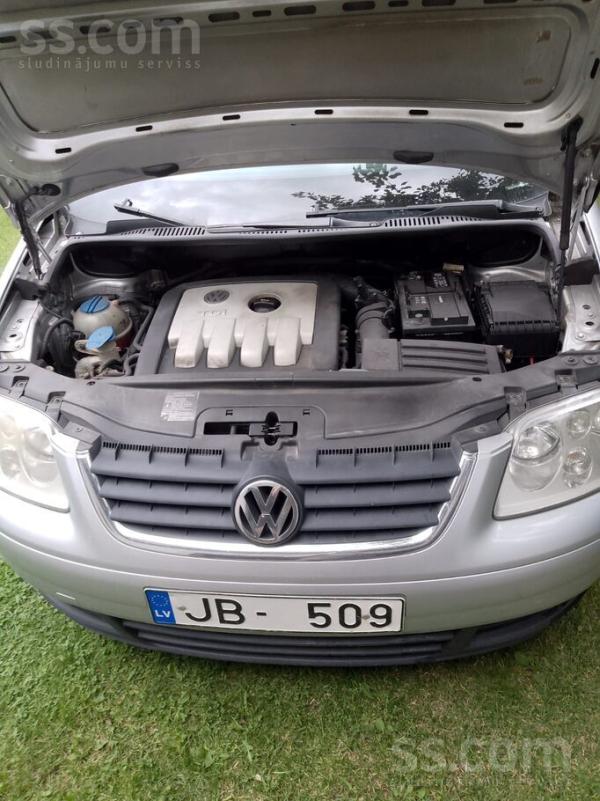 Pelēks Volkswagen Touran 2006 Rīga, ar dzinēja tilpumu 2.00 L un nobraukumu 389 tūkst. km par 900 €, foto 2 vietnē AUTOMOTO.COM.LV