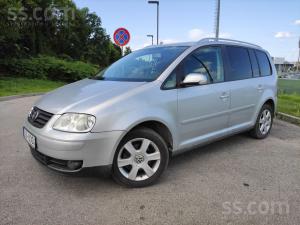 Pelēks Volkswagen Touran 2006 Rēzekne, ar dzinēja tilpumu 2.00 L un nobraukumu 292 tūkst. km par 2350 €, foto  vietnē AUTOMOTO.COM.LV