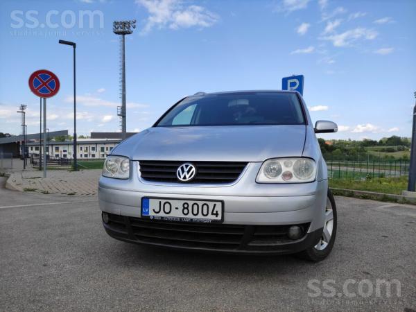 Grey Volkswagen Touran 2006 in Rezekne, with an engine capacity of 2.00 L and mileage of 292 thousand km for 2350 €, photo 5 on AUTOMOTO.COM.LV