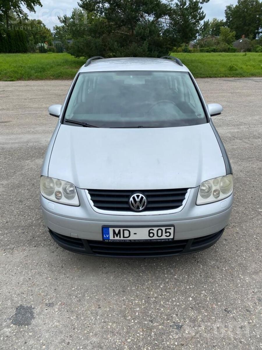 Grey Volkswagen Touran 2006 in Valmiera, with an engine capacity of 2.00 L and mileage of 288 thousand km for 920 €, photo 1 on AUTOMOTO.COM.LV