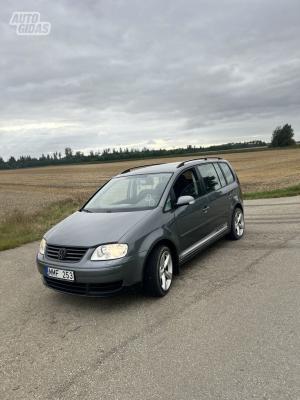 Grey Volkswagen Touran 2006 in Joniskis, with an engine capacity of 2.00 L and mileage of 253 thousand km for 1700 €, photo 1 on AUTOMOTO.COM.LV