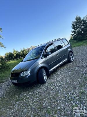 Grey Volkswagen Touran 2006 in Joniskis, with an engine capacity of 2.00 L and mileage of 253 thousand km for 1700 €, photo 4 on AUTOMOTO.COM.LV