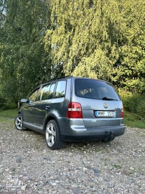Grey Volkswagen Touran 2006 in Joniskis, with an engine capacity of 2.00 L and mileage of 253 thousand km for 1700 €, photo 5 on AUTOMOTO.COM.LV