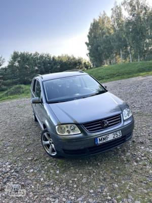 Grey Volkswagen Touran 2006 in Joniskis, with an engine capacity of 2.00 L and mileage of 253 thousand km for 1700 €, photo 7 on AUTOMOTO.COM.LV